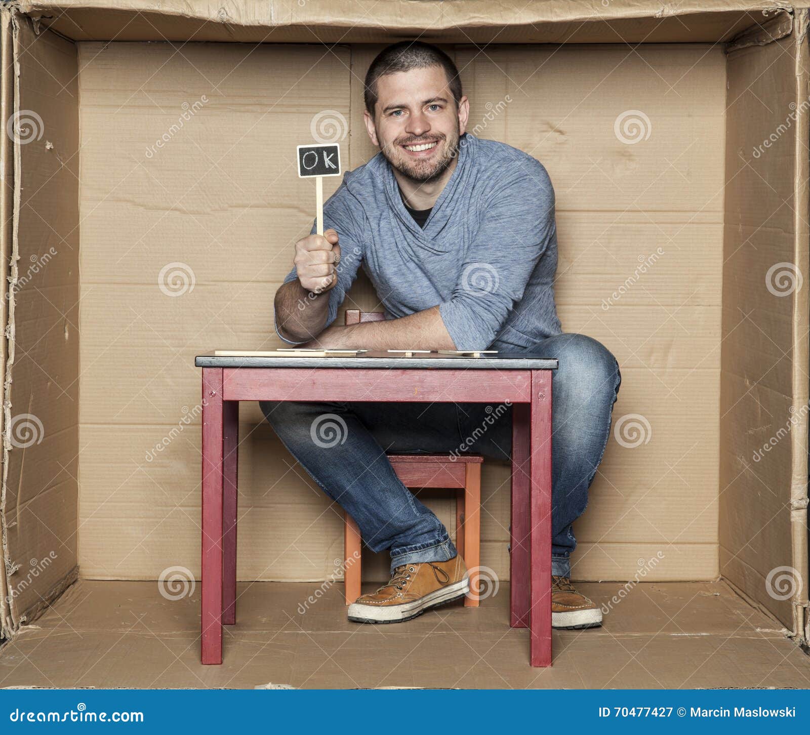 Man in a Box with a Badge OK Stock Image - Image of expression, look ...