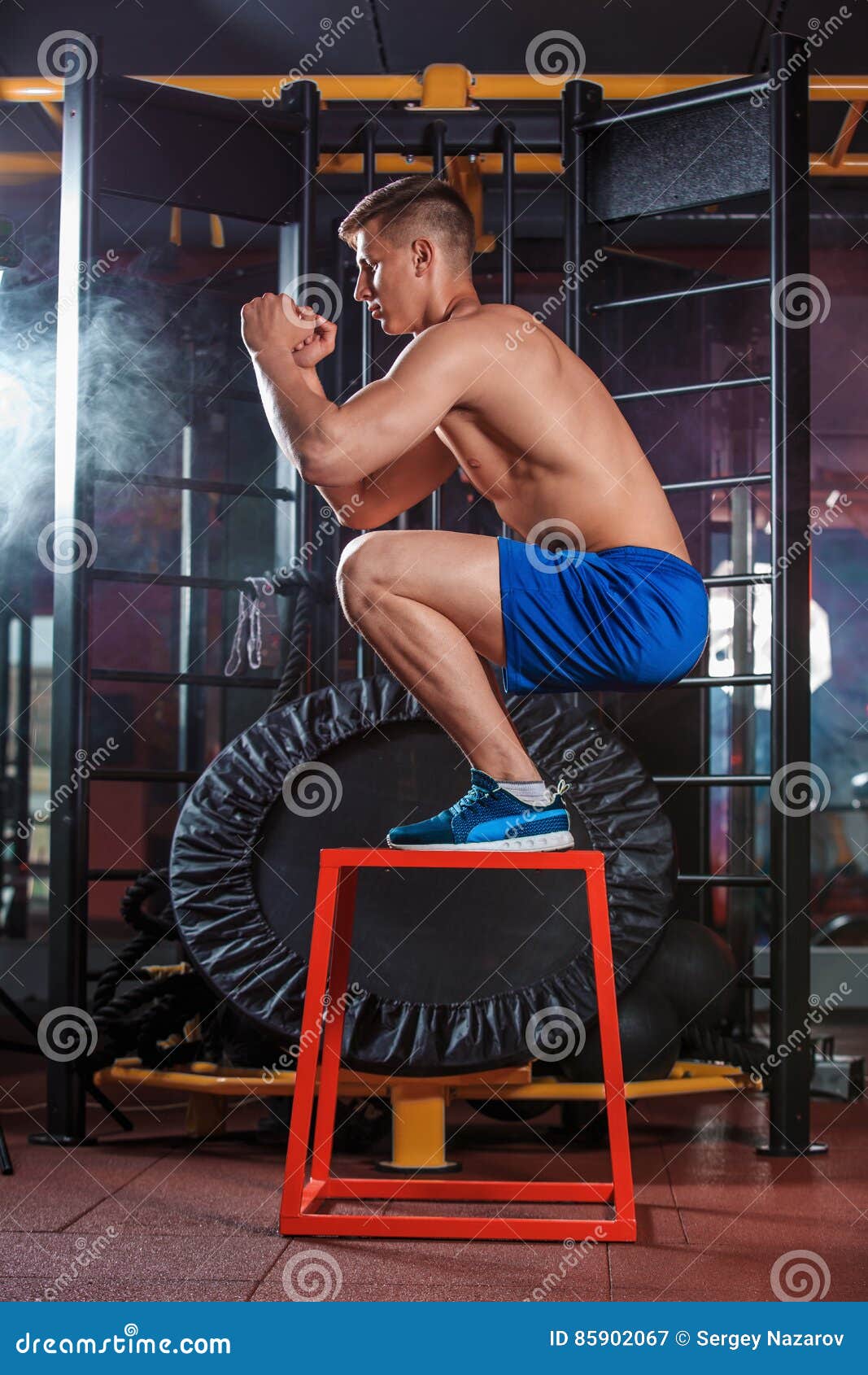 Man Box Jumping at a Crossfit Style Gym. Stock Image - Image of ...