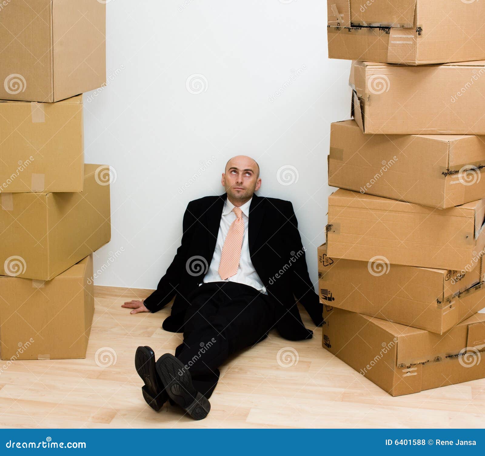 Man between boxes stock photo. Image of businessman, hardwood - 6401588