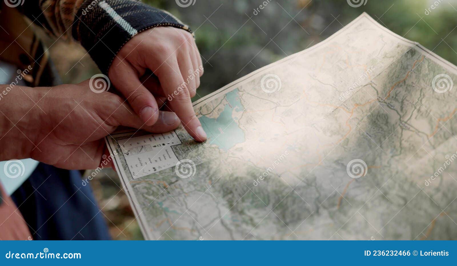 A Man and a Boy are Reading a Map Stock Photo - Image of hiking ...