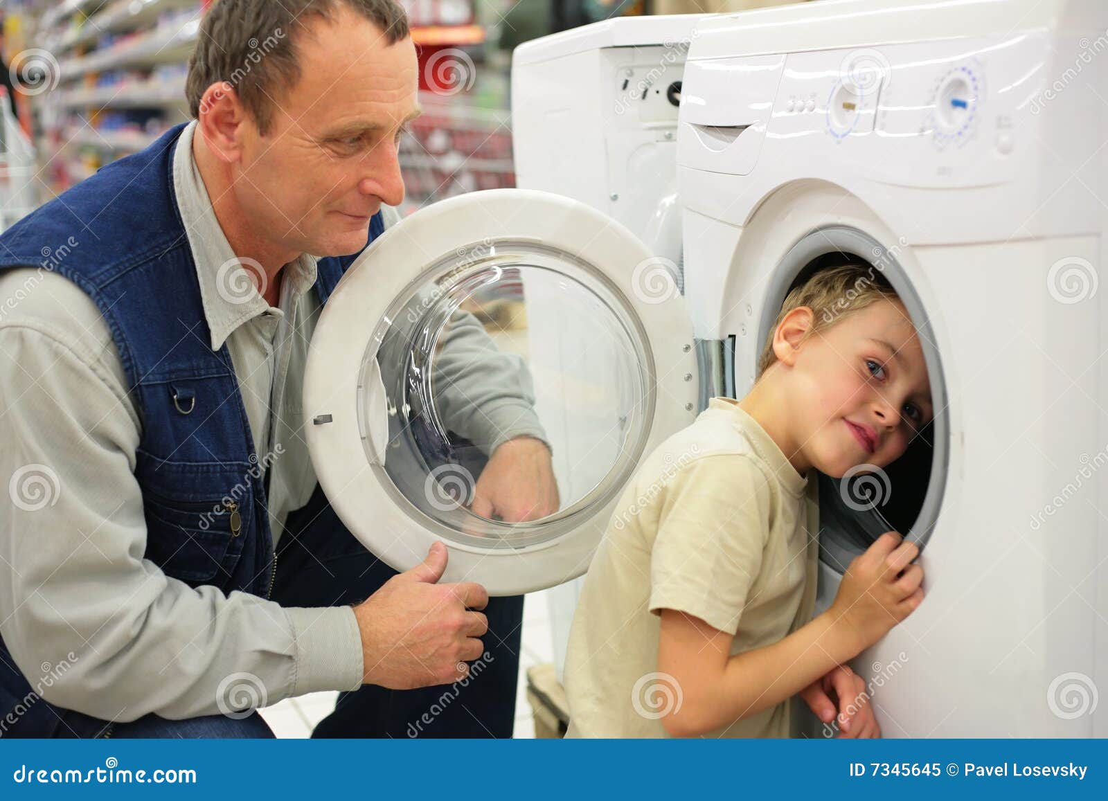 Man and Boy with Washing Machine Stock Image - Image of purchase, human ...