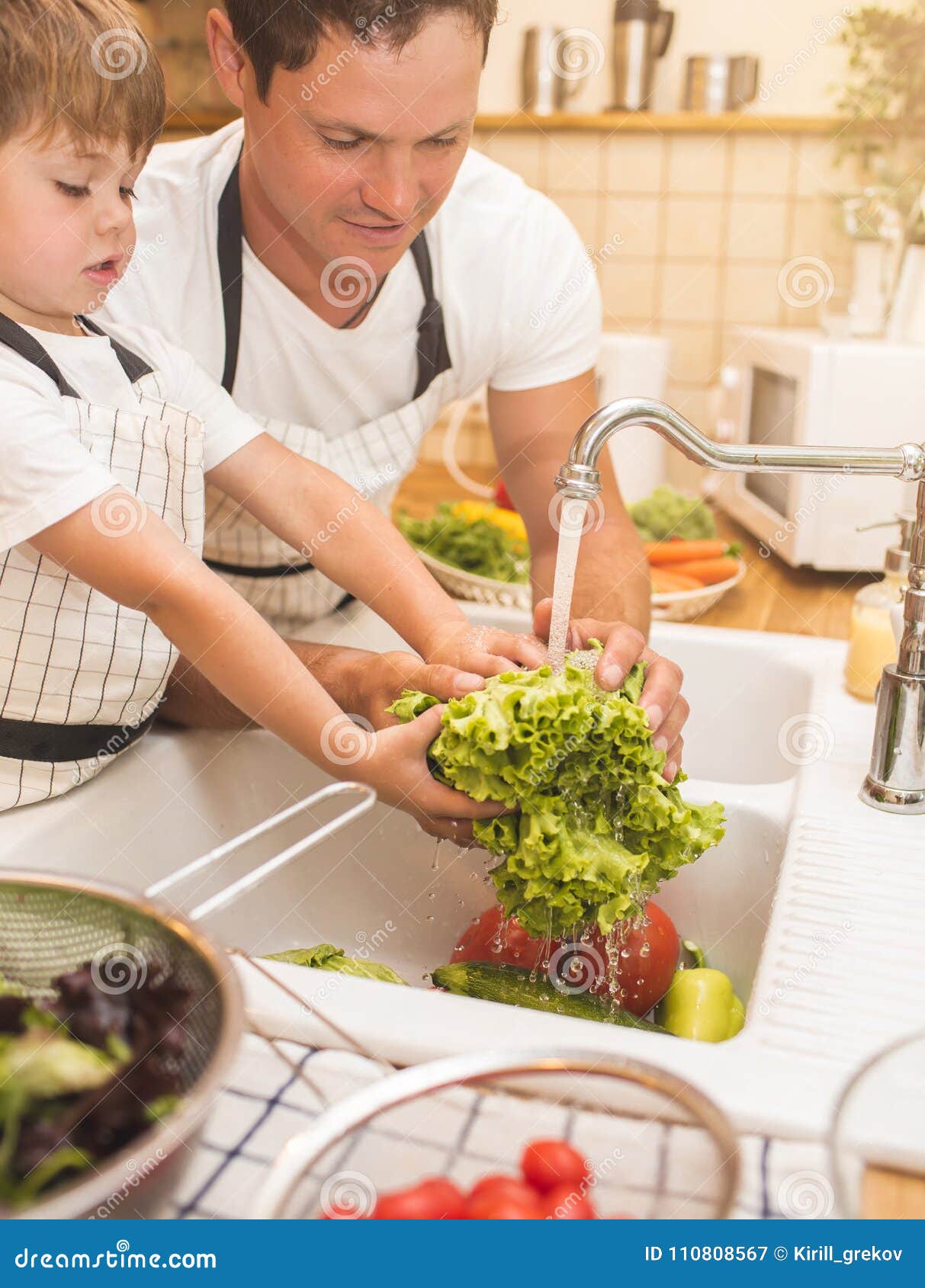 Man and Boy Washing Vegetables before Eating Stock Image - Image of ...