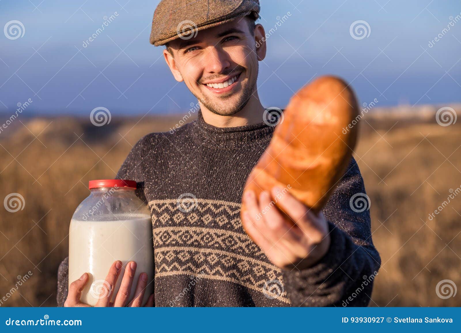 Man with Bread and Milk in a Field Stock Image - Image of milk, give ...