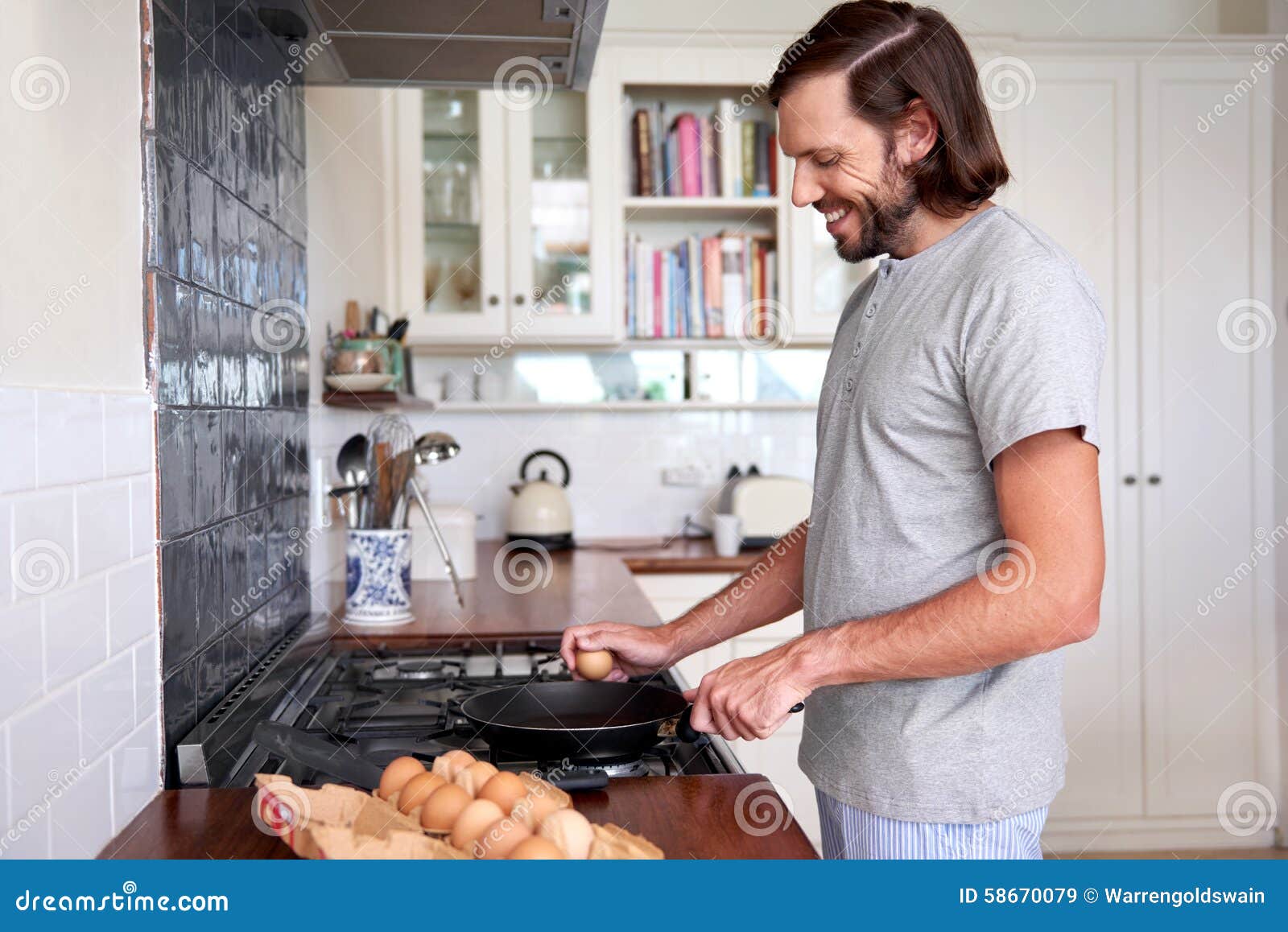 Man breakfast eggs stock image. Image of young, eggs - 58670079