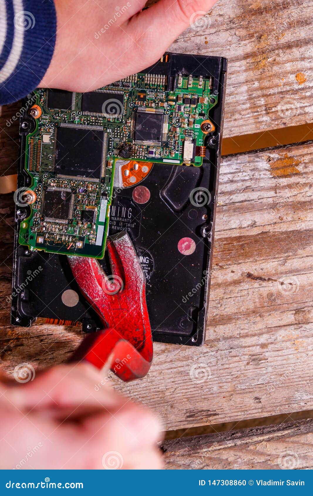 A Man Breaks a Computer Using Locksmith Tools Stock Photo - Image of ...