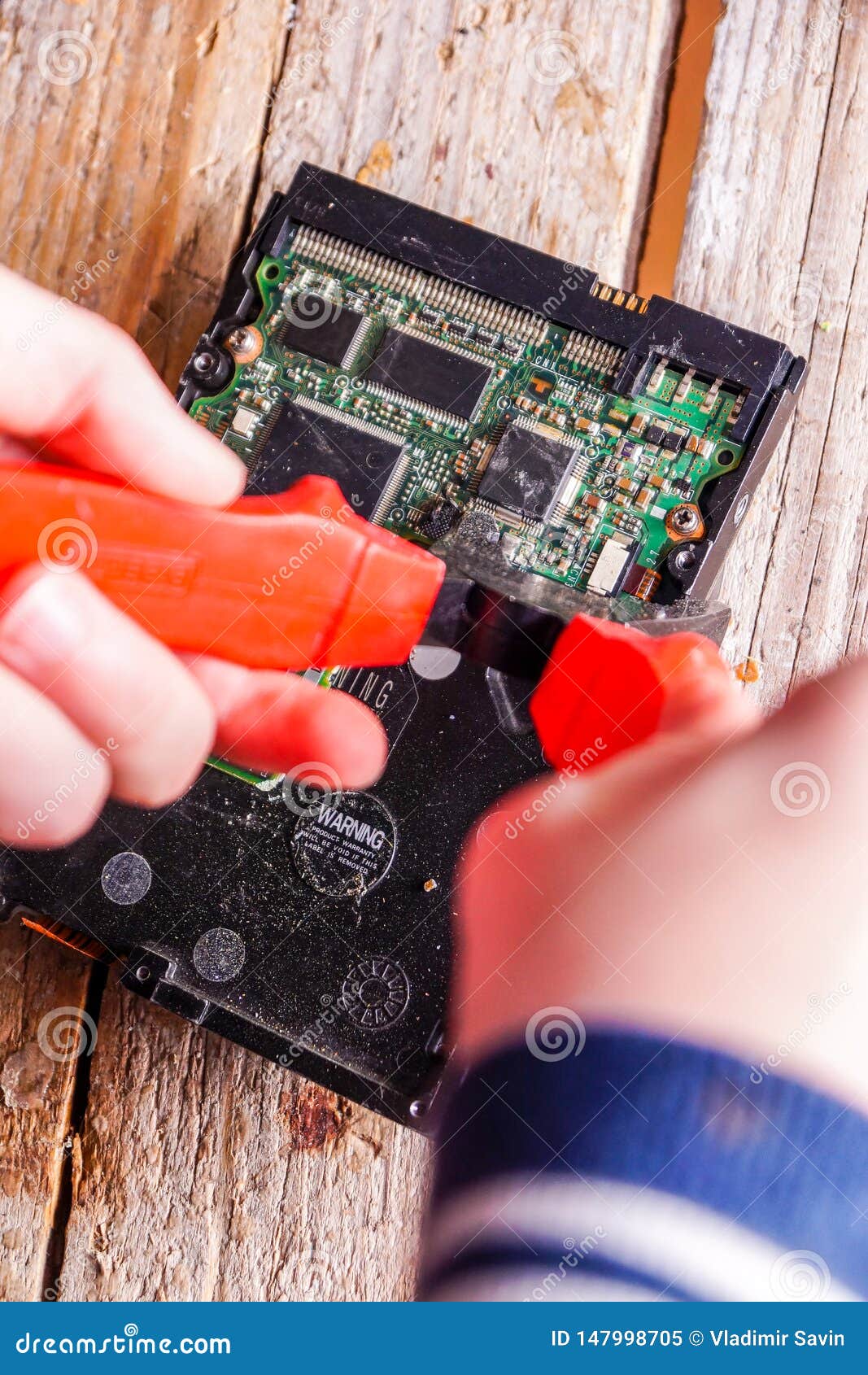 A Man Breaks a Computer Using Locksmith Tools Stock Image - Image of ...