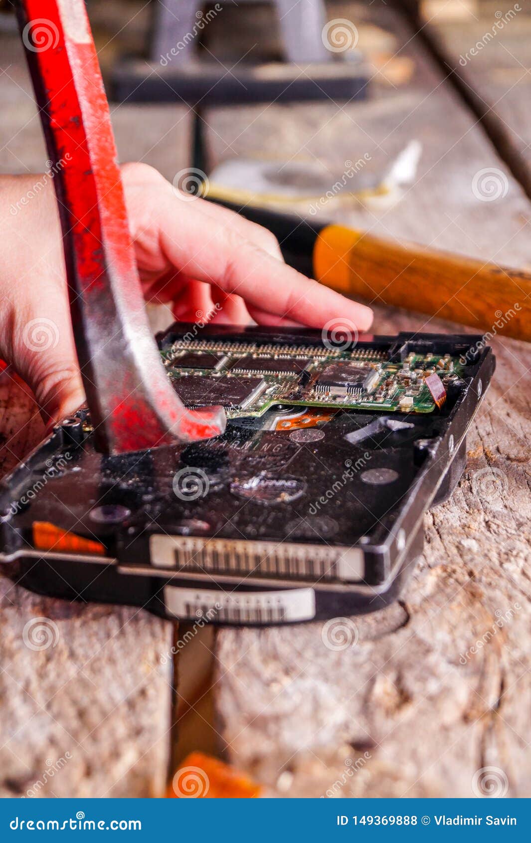 A Man Breaks a Computer Using Locksmith Tools Stock Photo - Image of ...