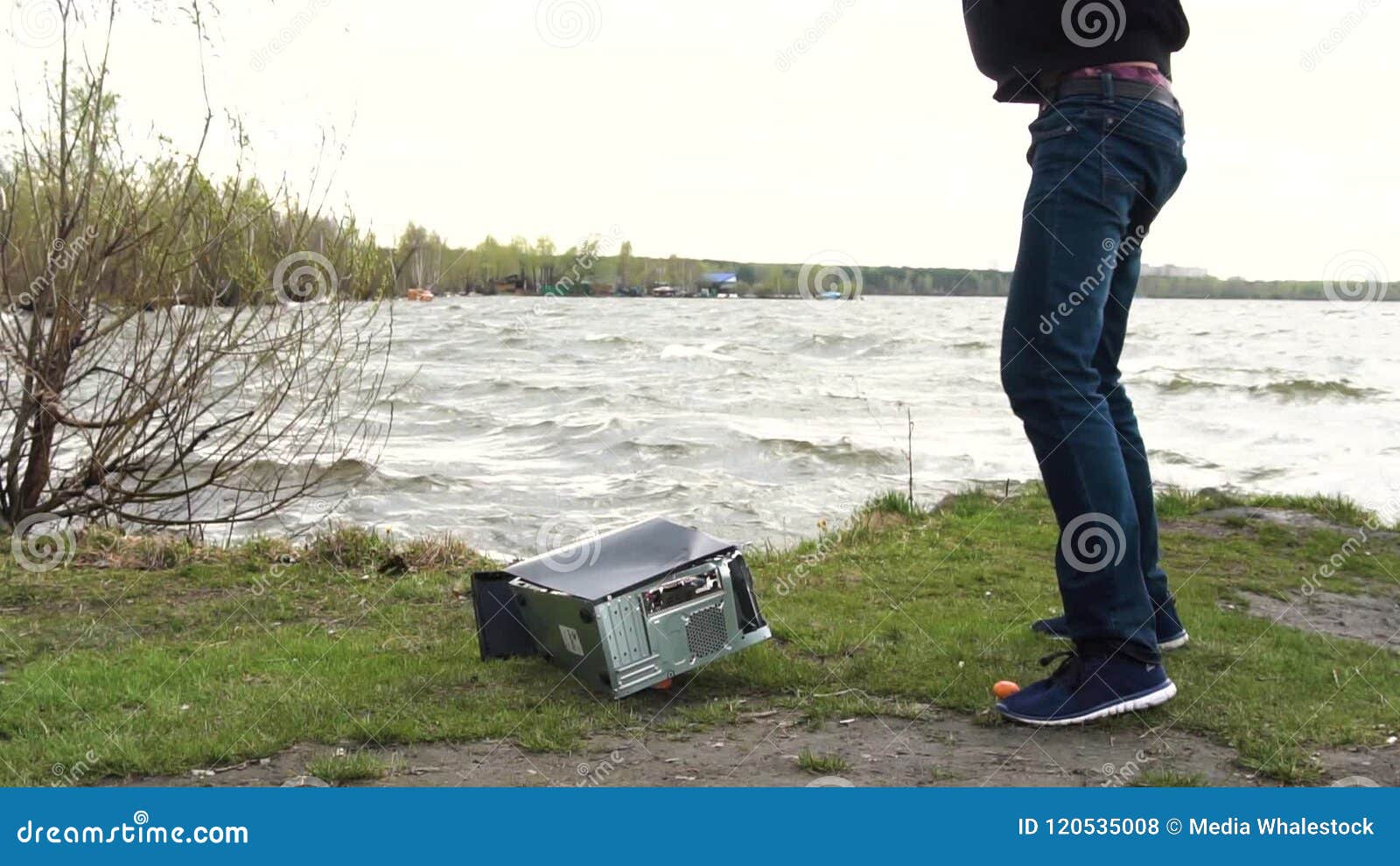 Man Breaks a Hammer System Unit Computer. Man with a Sledge Hammer and ...