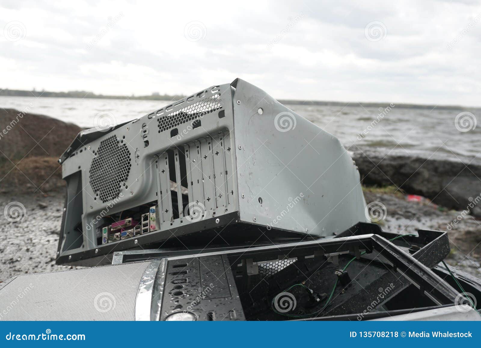 Man Breaks a Hammer System Unit Computer. Man with a Sledge Hammer and ...