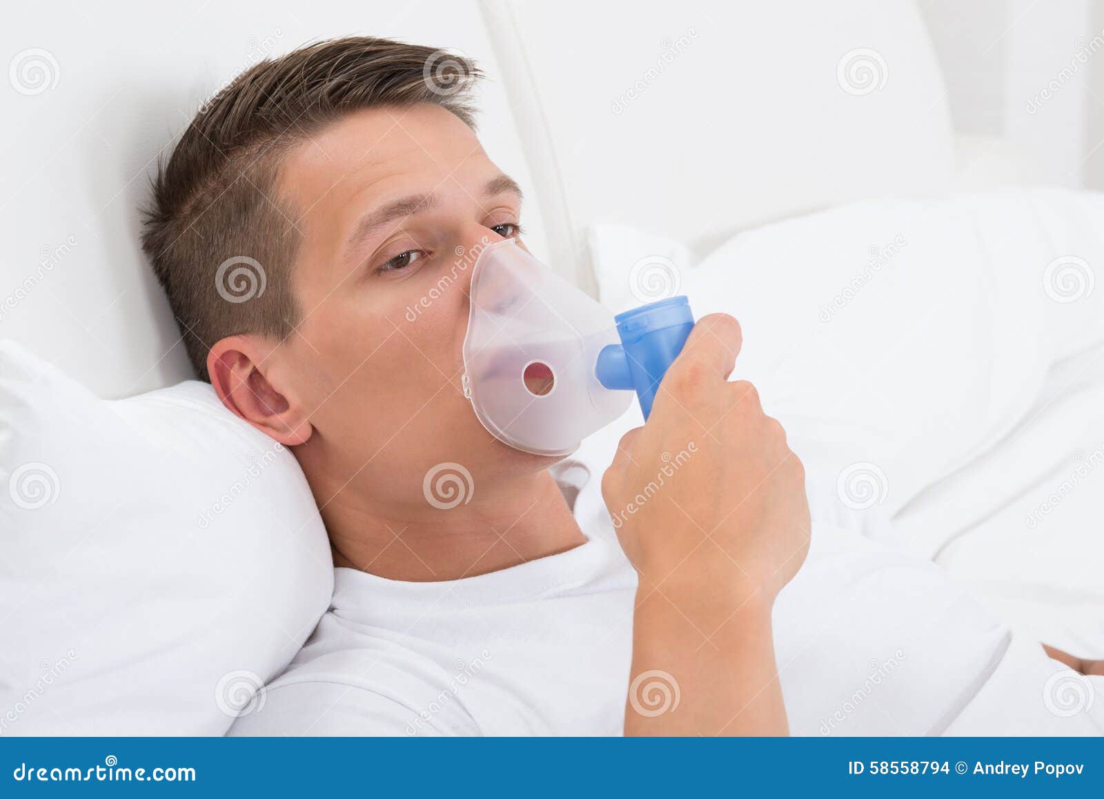 Man Breathing through Inhaler Mask Stock Photo - Image of disease ...