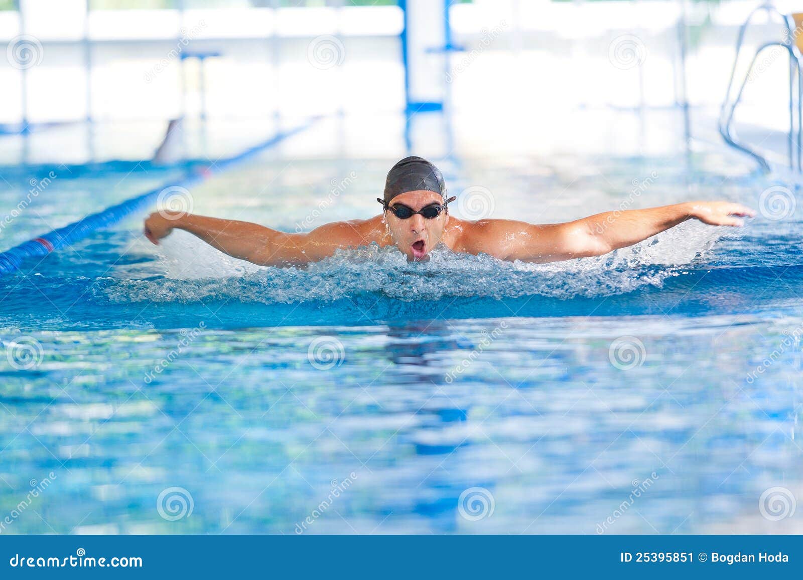 Man Breathing While Swimming Butterfly Strokes Royalty-Free Stock ...