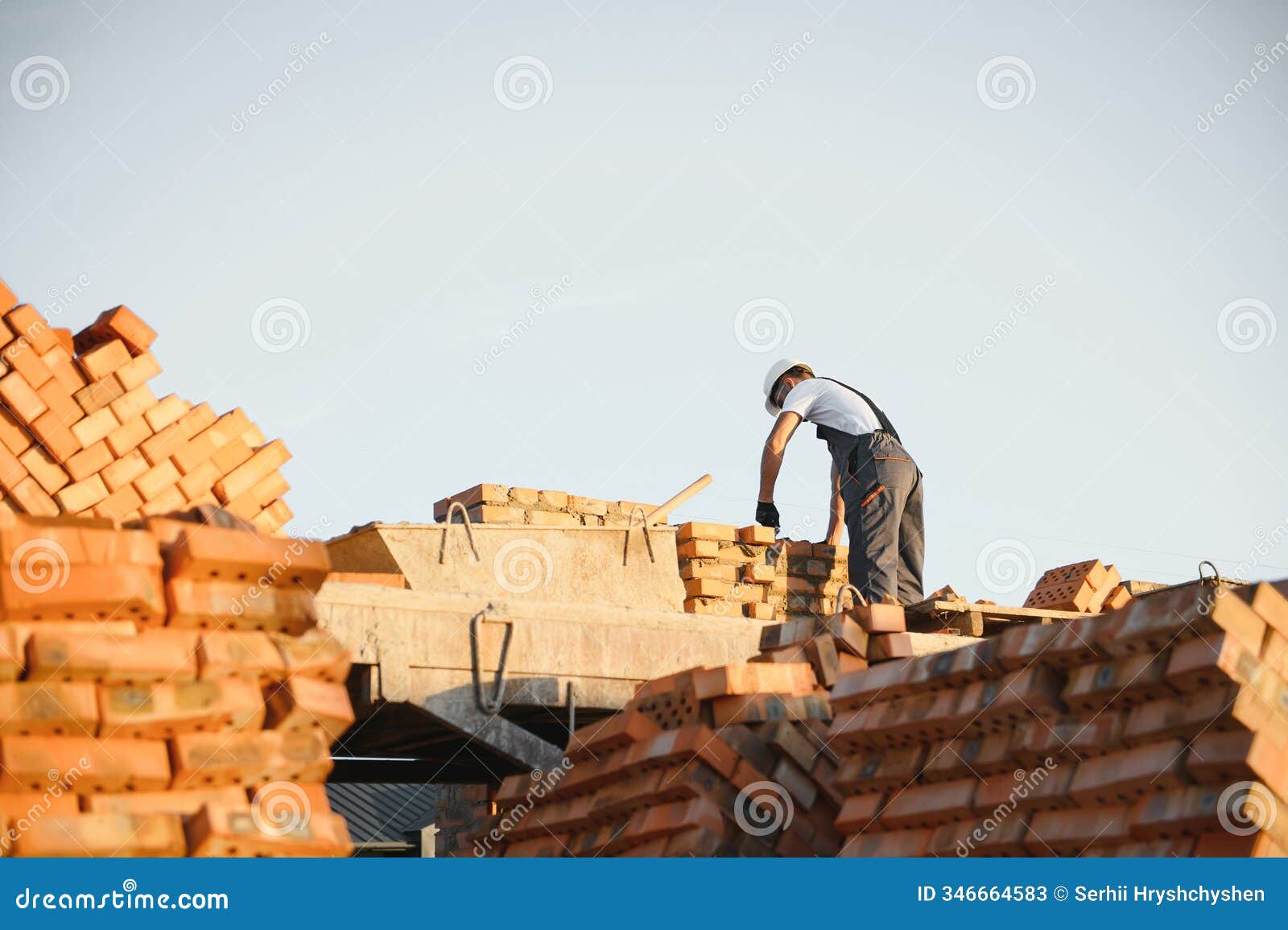Man Bricklayer Installing Bricks on Construction Site Stock Image ...