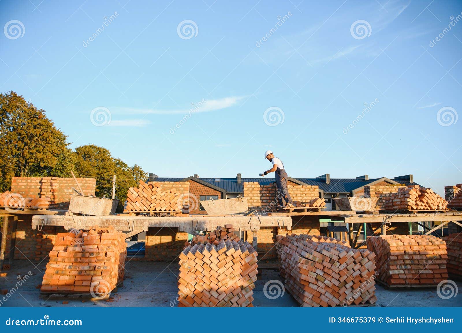 Man Bricklayer Installing Bricks on Construction Site Stock Image ...