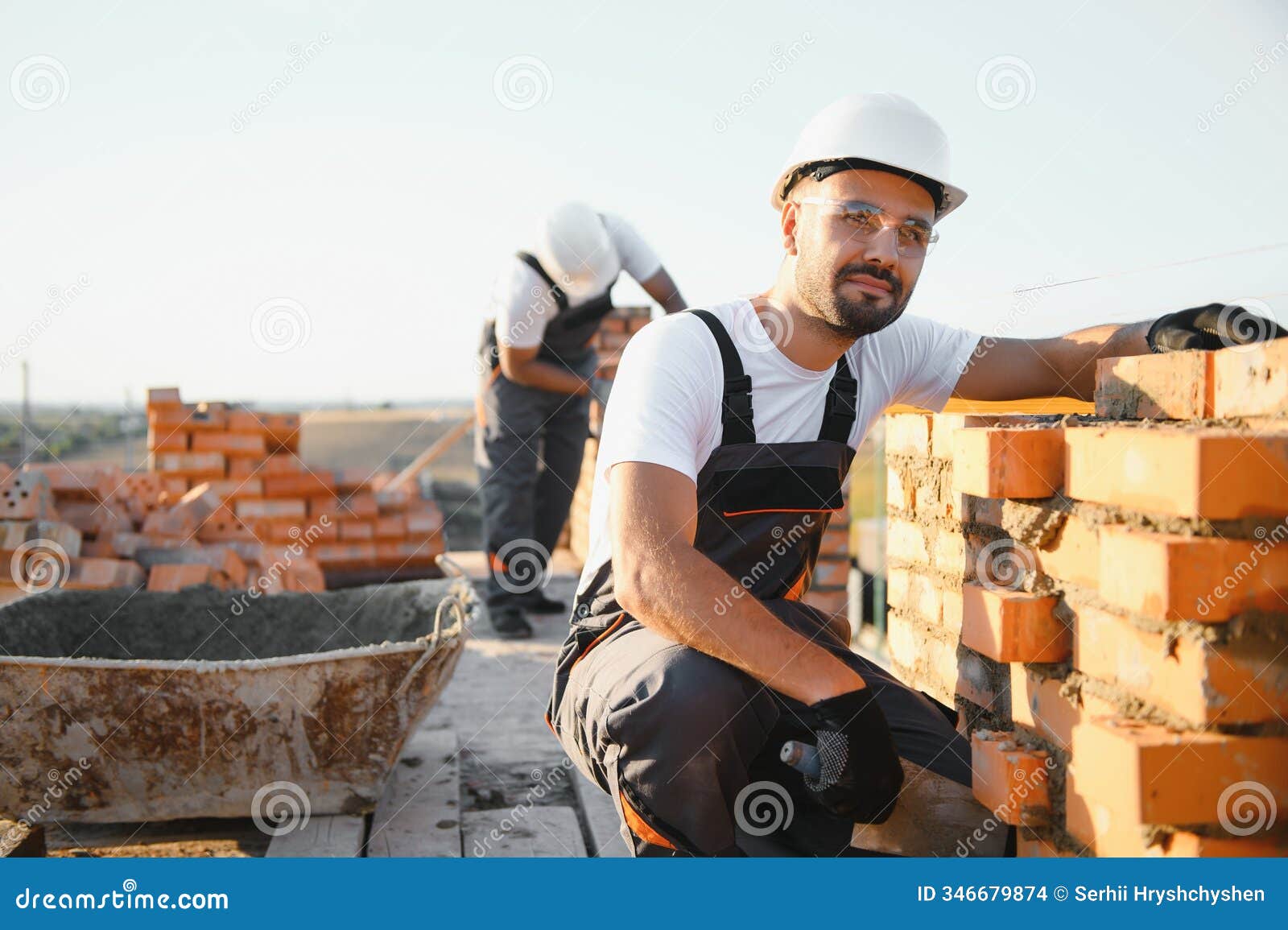 Man Bricklayer Installing Bricks on Construction Site Stock Photo ...