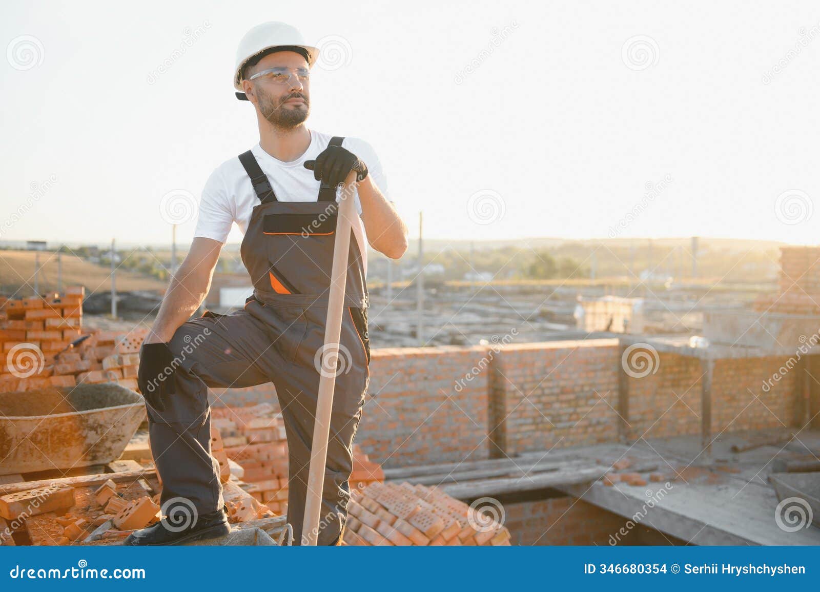 Man Bricklayer Installing Bricks on Construction Site Stock Photo ...