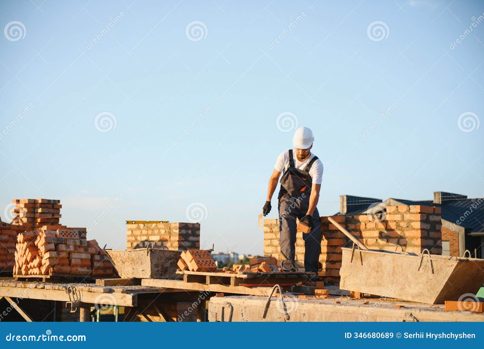 Man Bricklayer Installing Bricks on Construction Site Stock Image ...