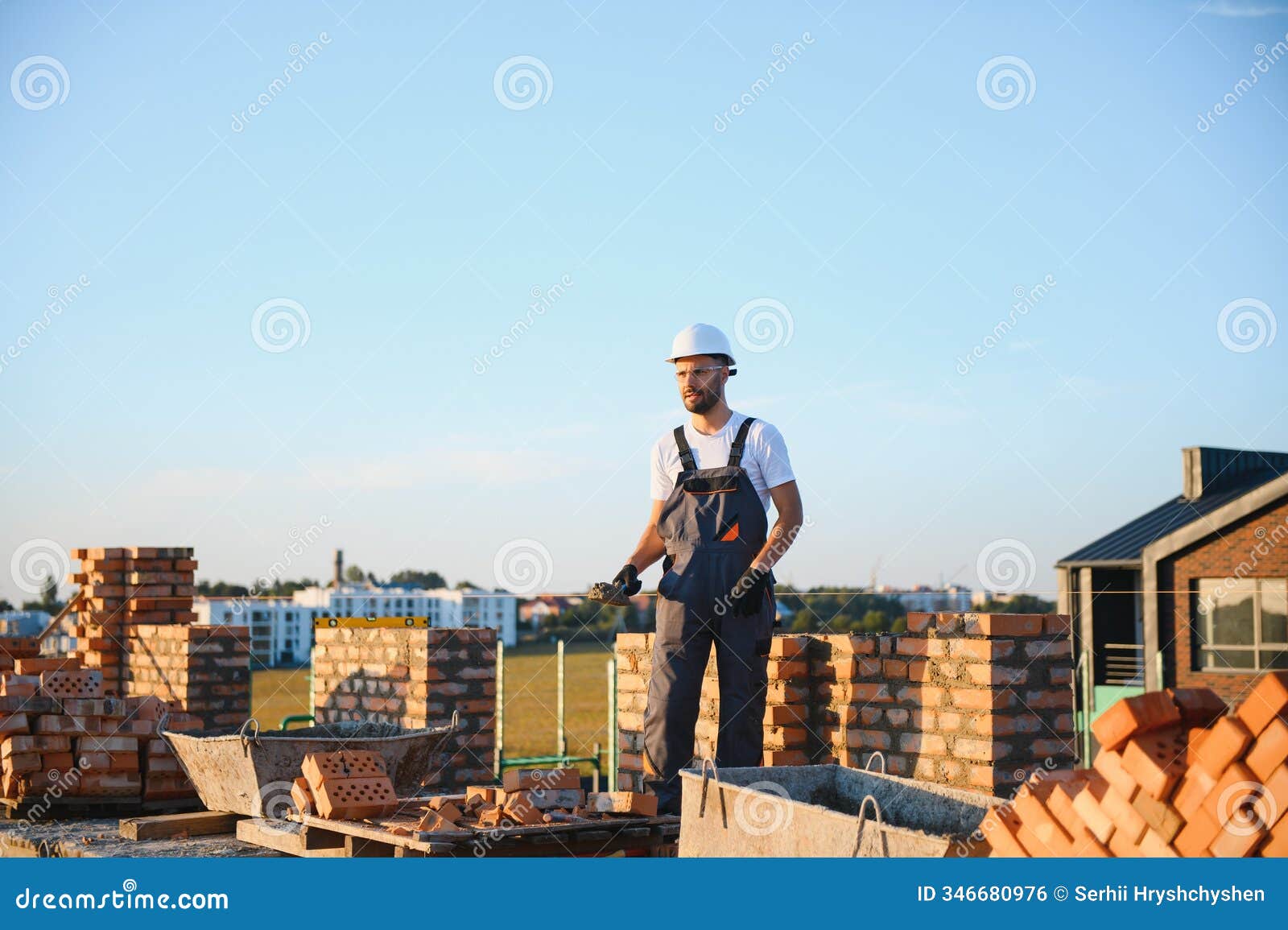 Man Bricklayer Installing Bricks on Construction Site Stock Photo ...