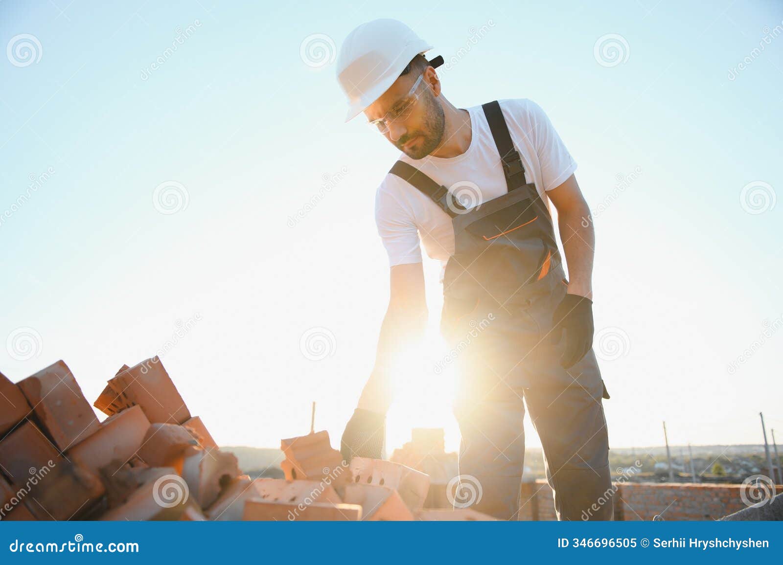 Man Bricklayer Installing Bricks on Construction Site Stock Image ...