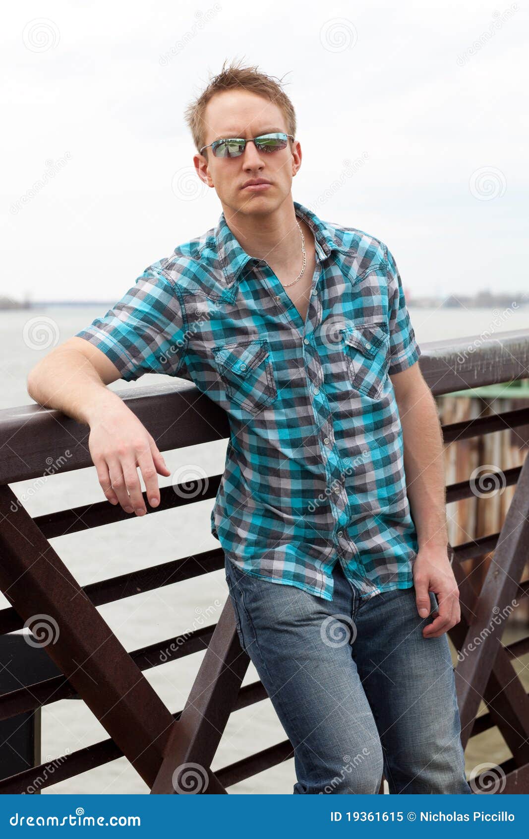 Man on Bridge stock image. Image of jeans, standing, casual - 19361615