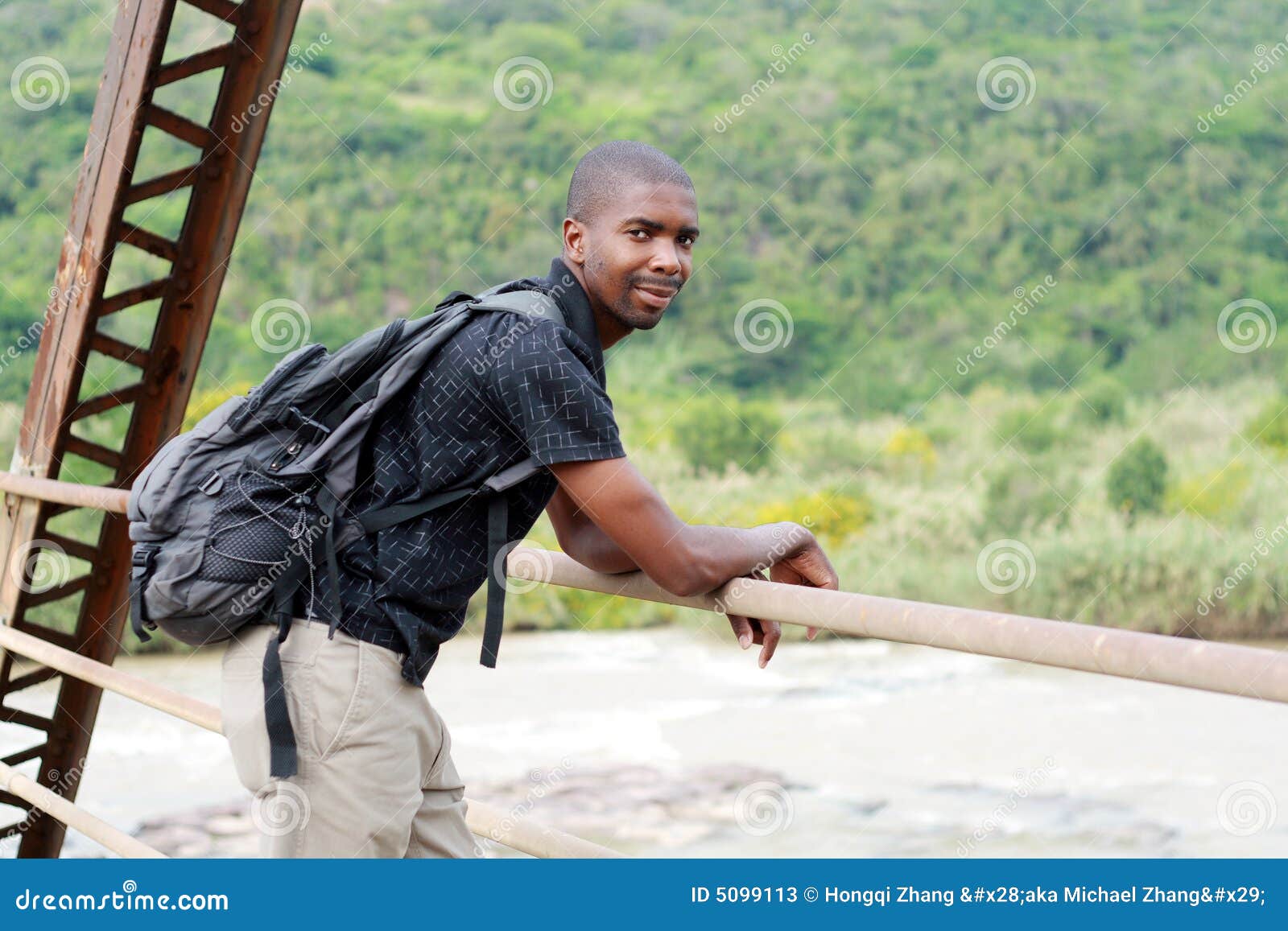Man on bridge stock image. Image of adventure, backpack - 5099113