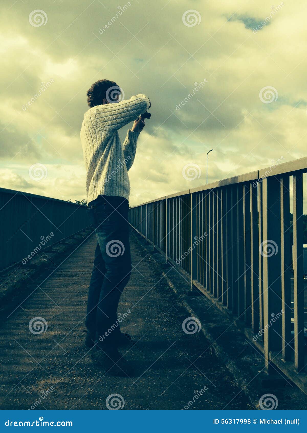 Man on bridge editorial stock photo. Image of taking - 56317998