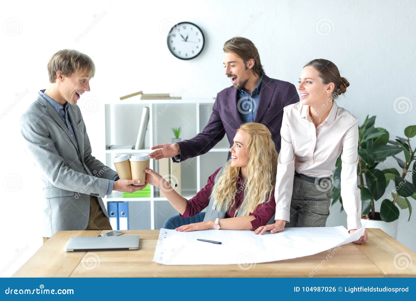 Man Bringing Coffee in Paper Cups Stock Photo - Image of interior ...