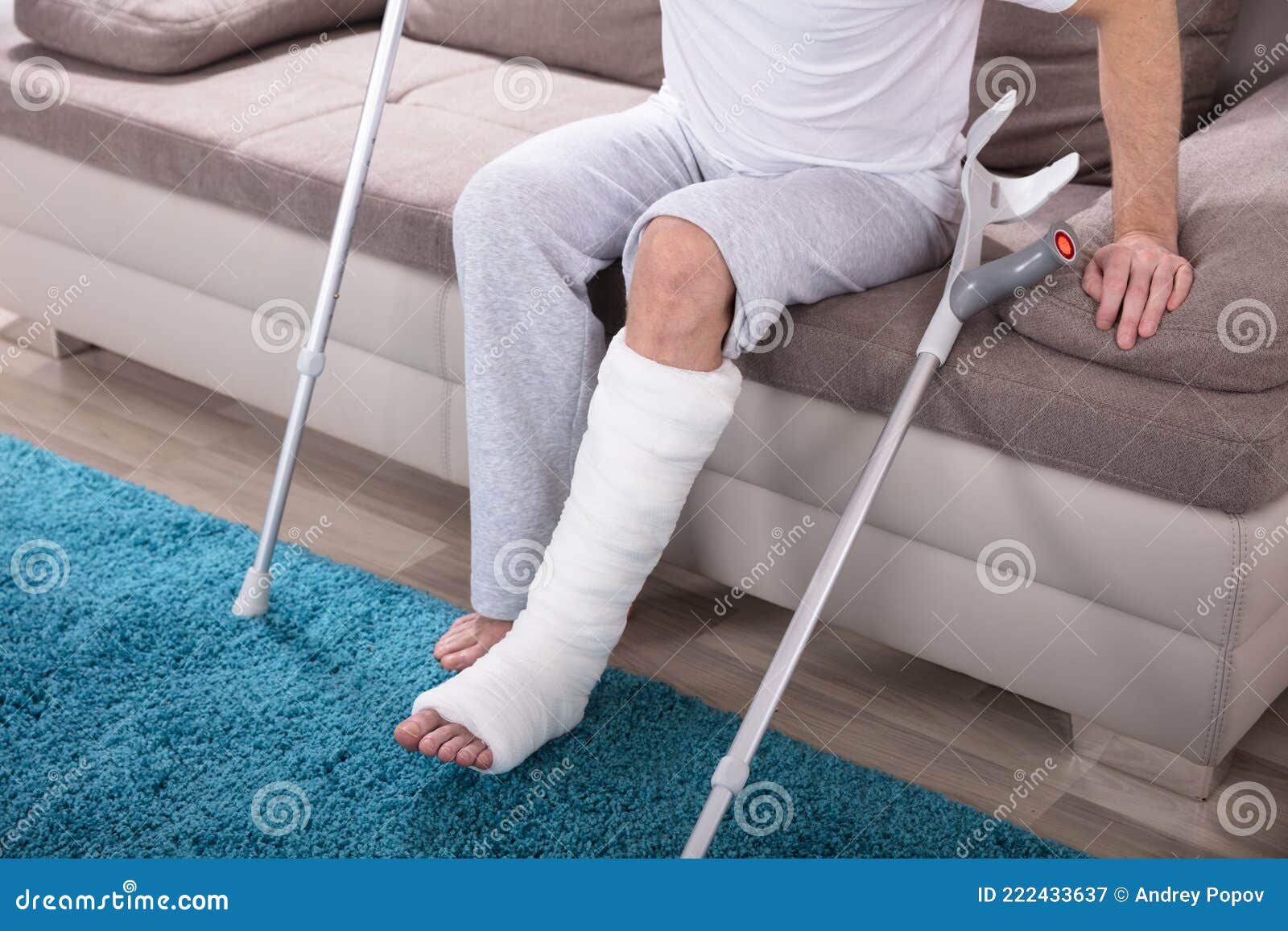 Man with Broken Leg Getting Up from Sofa Stock Image - Image of luxury ...
