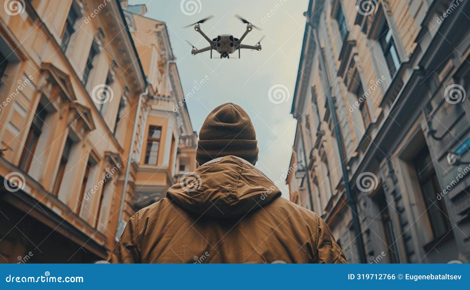 Man in Brown Jacket is Piloting Remote Controlled Dron UAV Stock ...