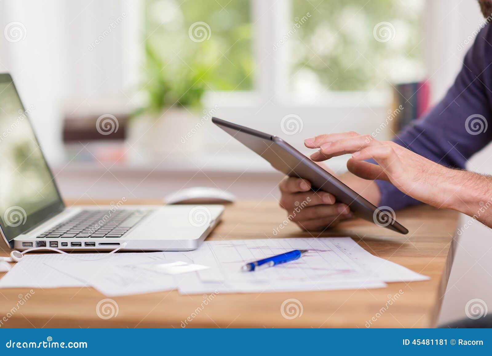 Man Browsing the Internet on a Tablet Stock Image - Image of casual ...