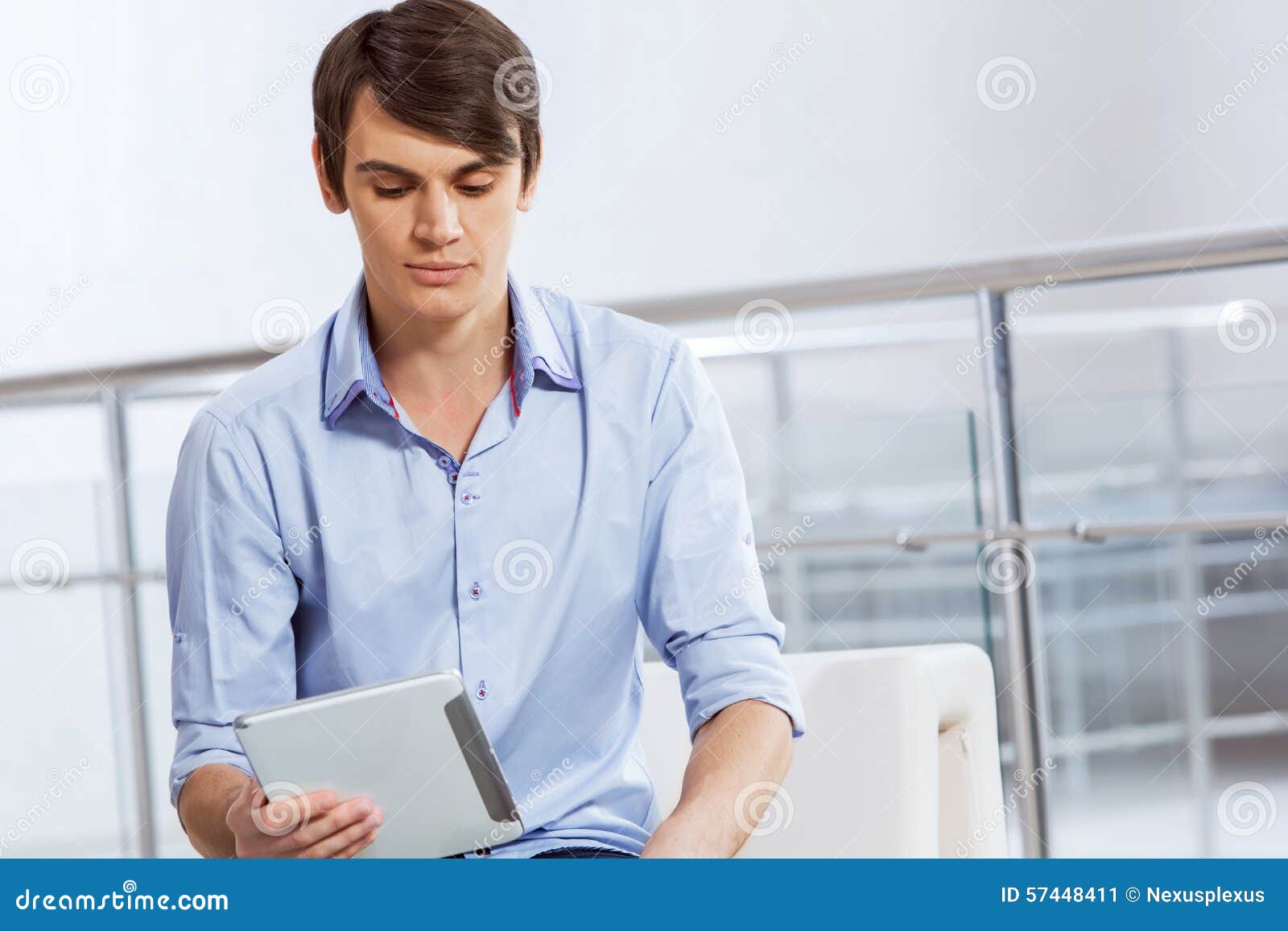 Man browsing web stock image. Image of sitting, table - 57448411