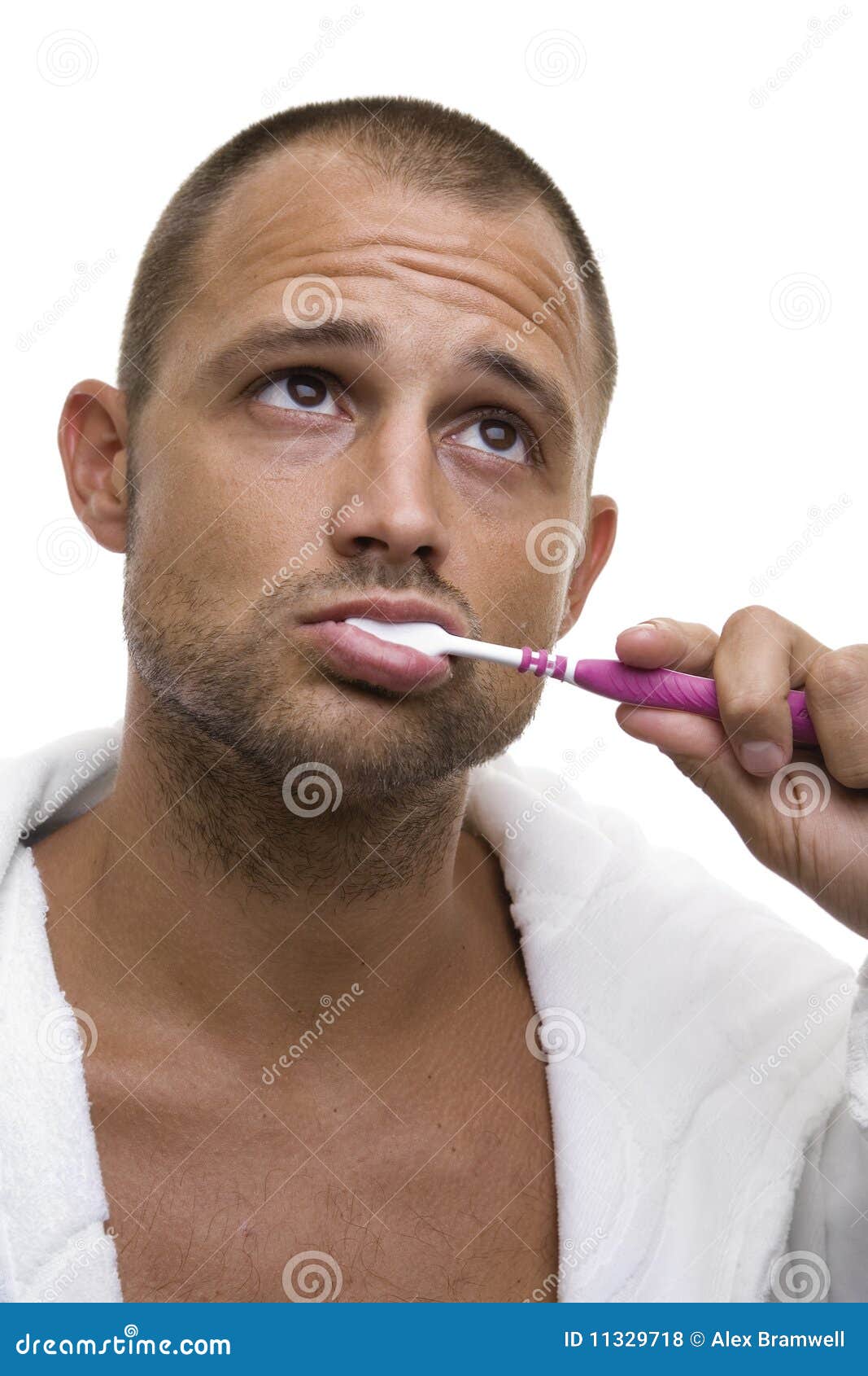Man Brushing his Teeth stock photo. Image of background - 11329718
