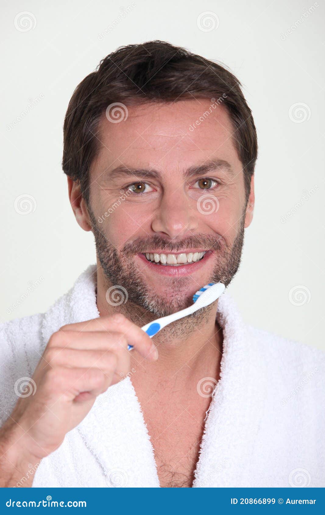 A man brushing his teeth stock image. Image of mouth - 20866899