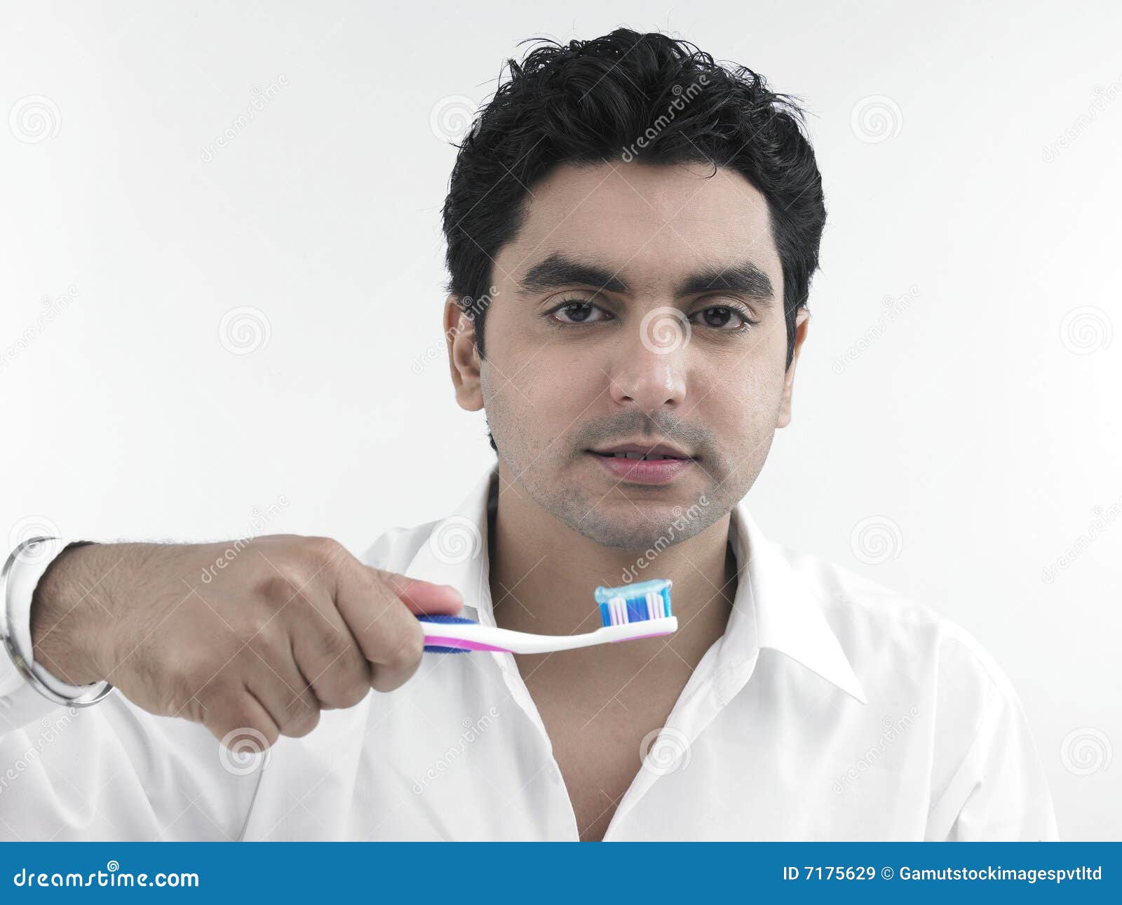 Man brushing his teeth stock image. Image of dental, colour - 7175629