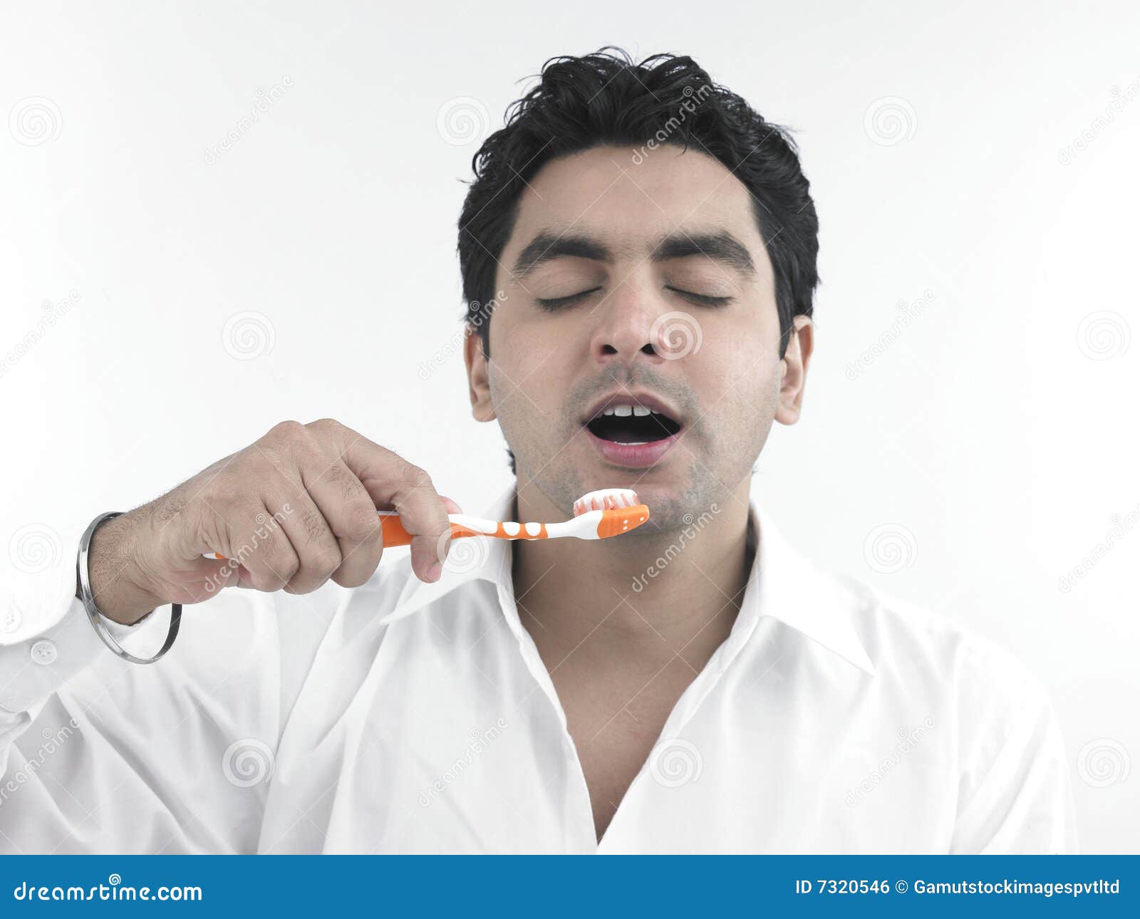Man brushing his teeth stock photo. Image of closeup, dental - 7320546