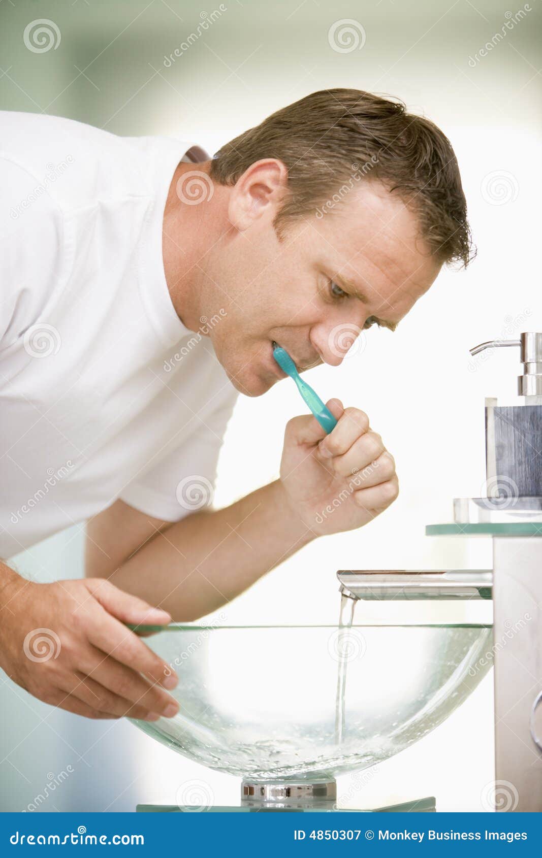Man Brushing Teeth in Bathroom Stock Image - Image of happy, color: 4850307
