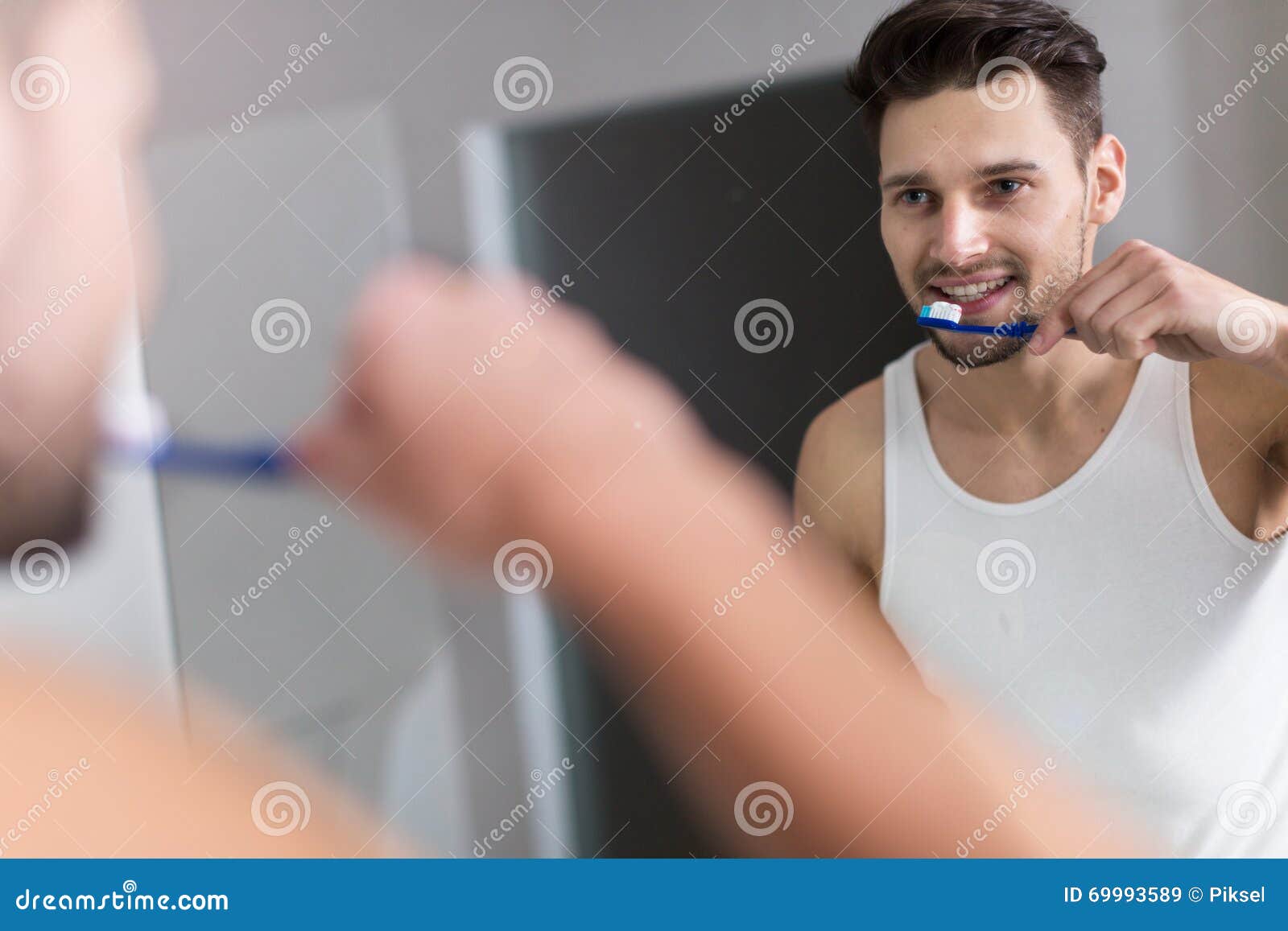 Man brushing teeth stock image. Image of washbasin, modern - 69993589