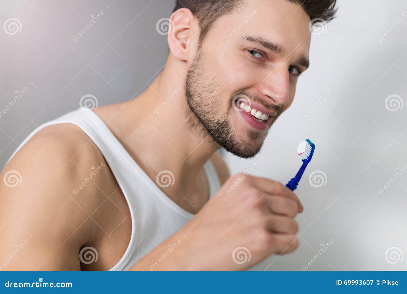 Man brushing teeth stock image. Image of home, morning - 69993607