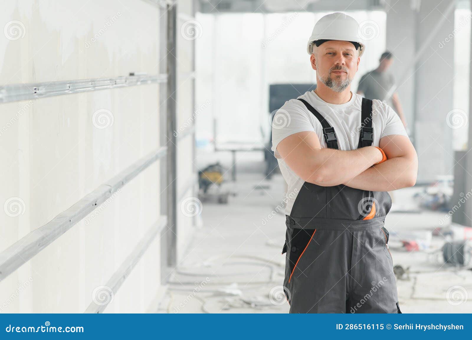 Man Builder. Architect is Standing in Building. Portrait of Thinking ...