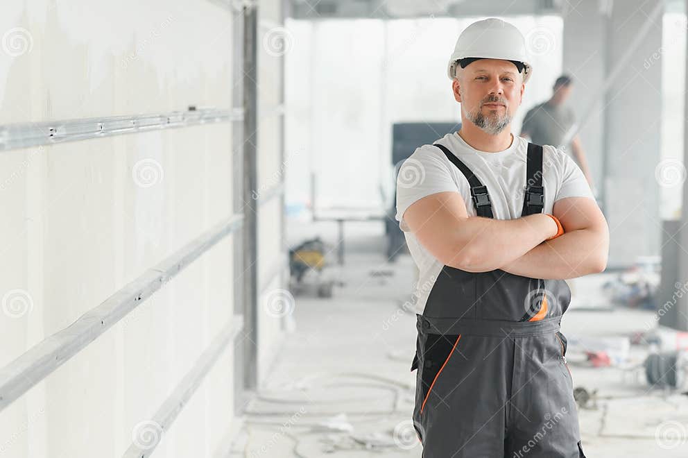 Man Builder. Architect is Standing in Building. Portrait of Thinking ...
