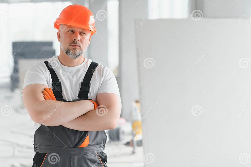 Man Builder. Architect is Standing in Building. Portrait of Thinking ...