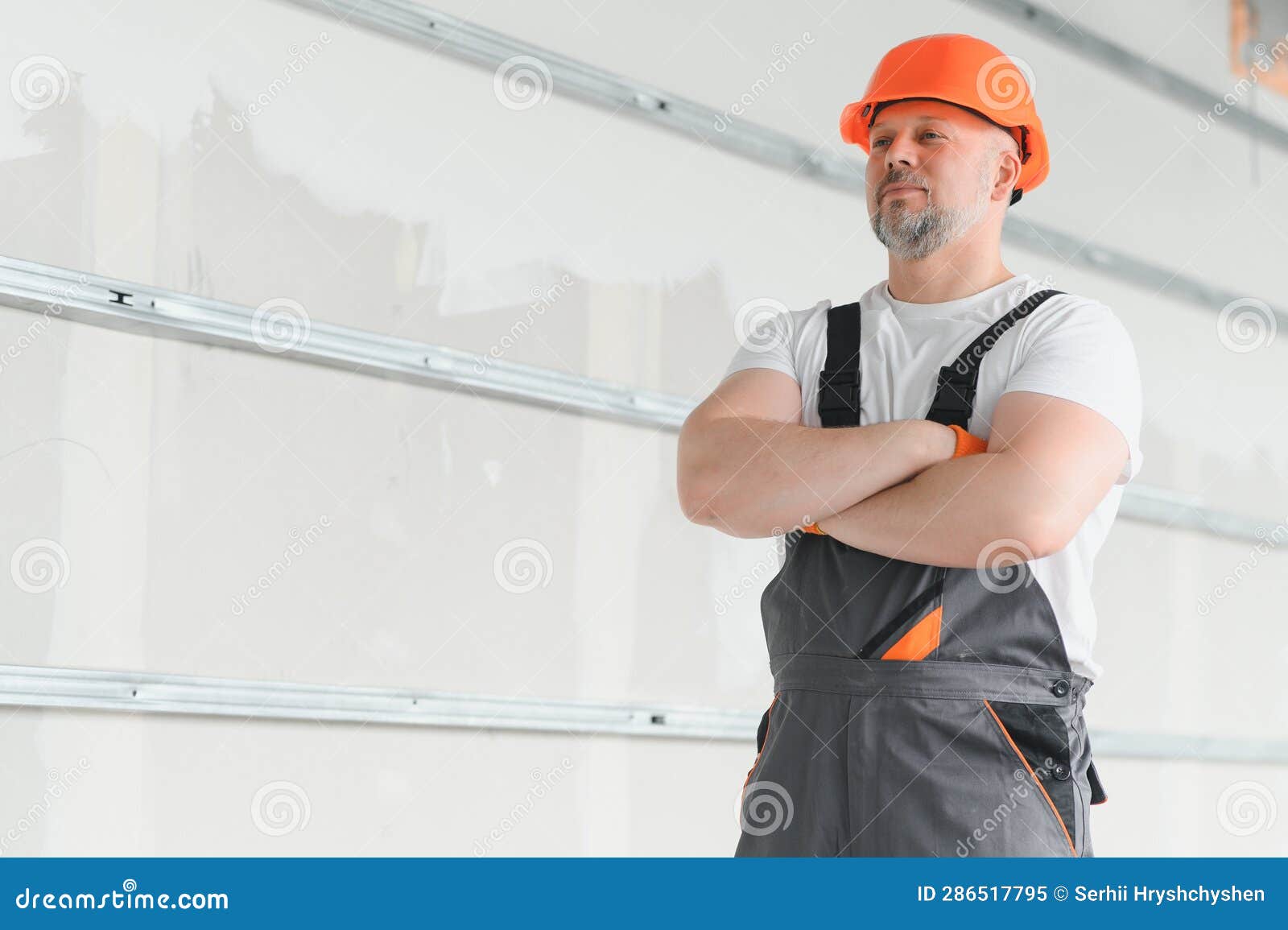 Man Builder. Architect is Standing in Building. Portrait of Thinking ...