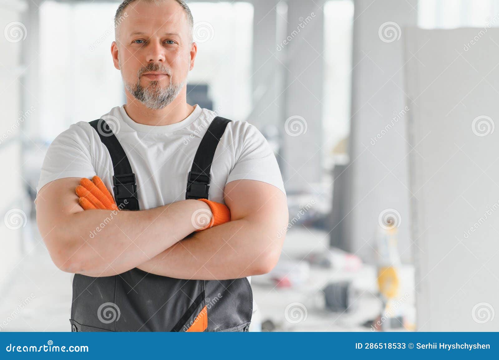 Man Builder. Architect is Standing in Building. Portrait of Thinking ...