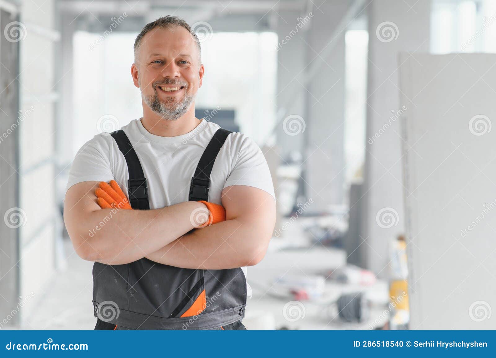 Man Builder. Architect is Standing in Building. Portrait of Thinking ...