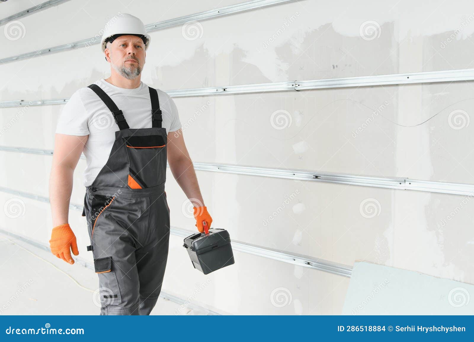 Man Builder. Architect is Standing in Building. Portrait of Thinking ...