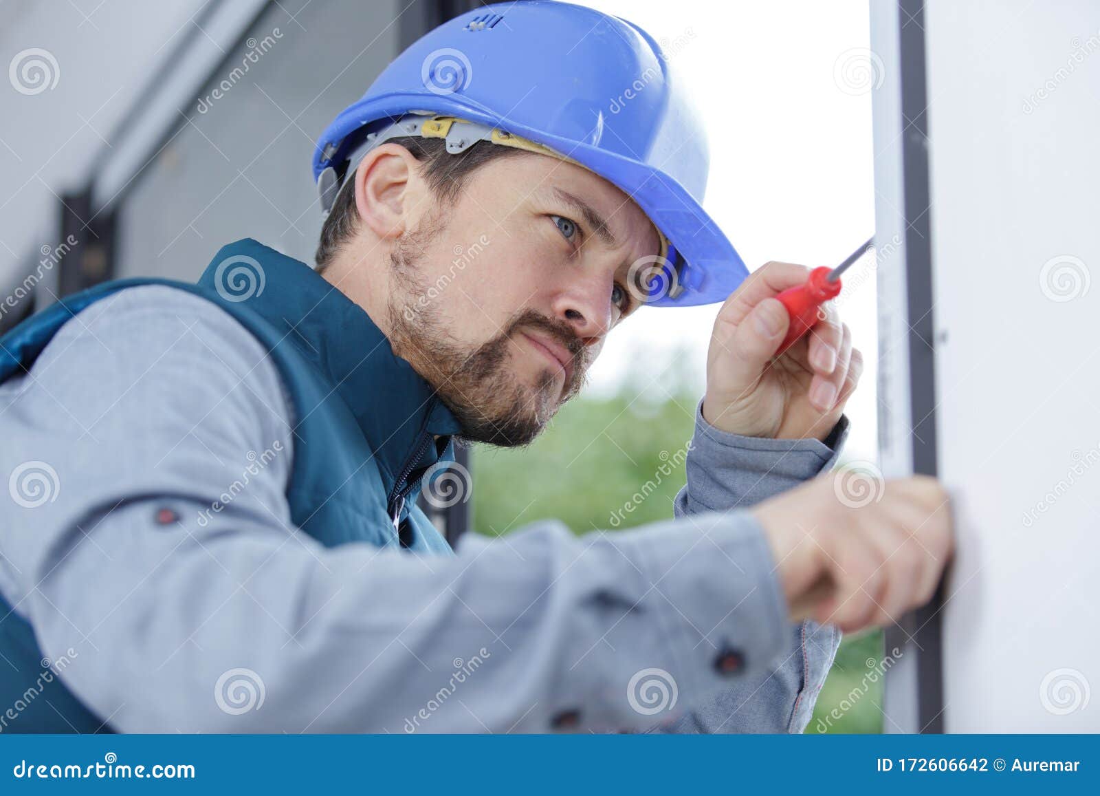 Man builder fixes window stock photo. Image of tool - 172606642