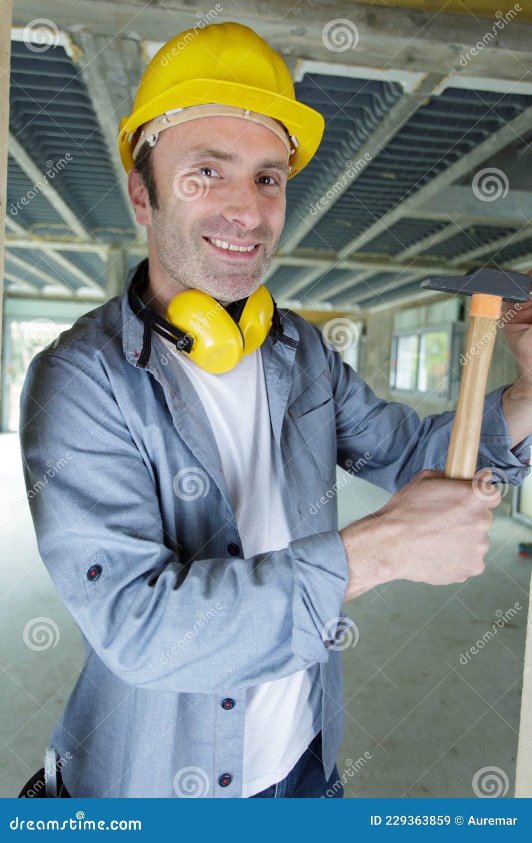 Man builder with hammer stock image. Image of adult - 229363859