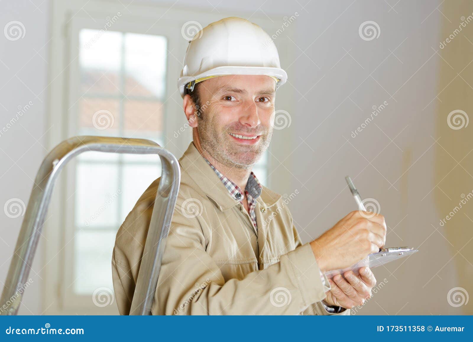 Man Builder in Hard Hat Looking at Camera Stock Photo - Image of ...