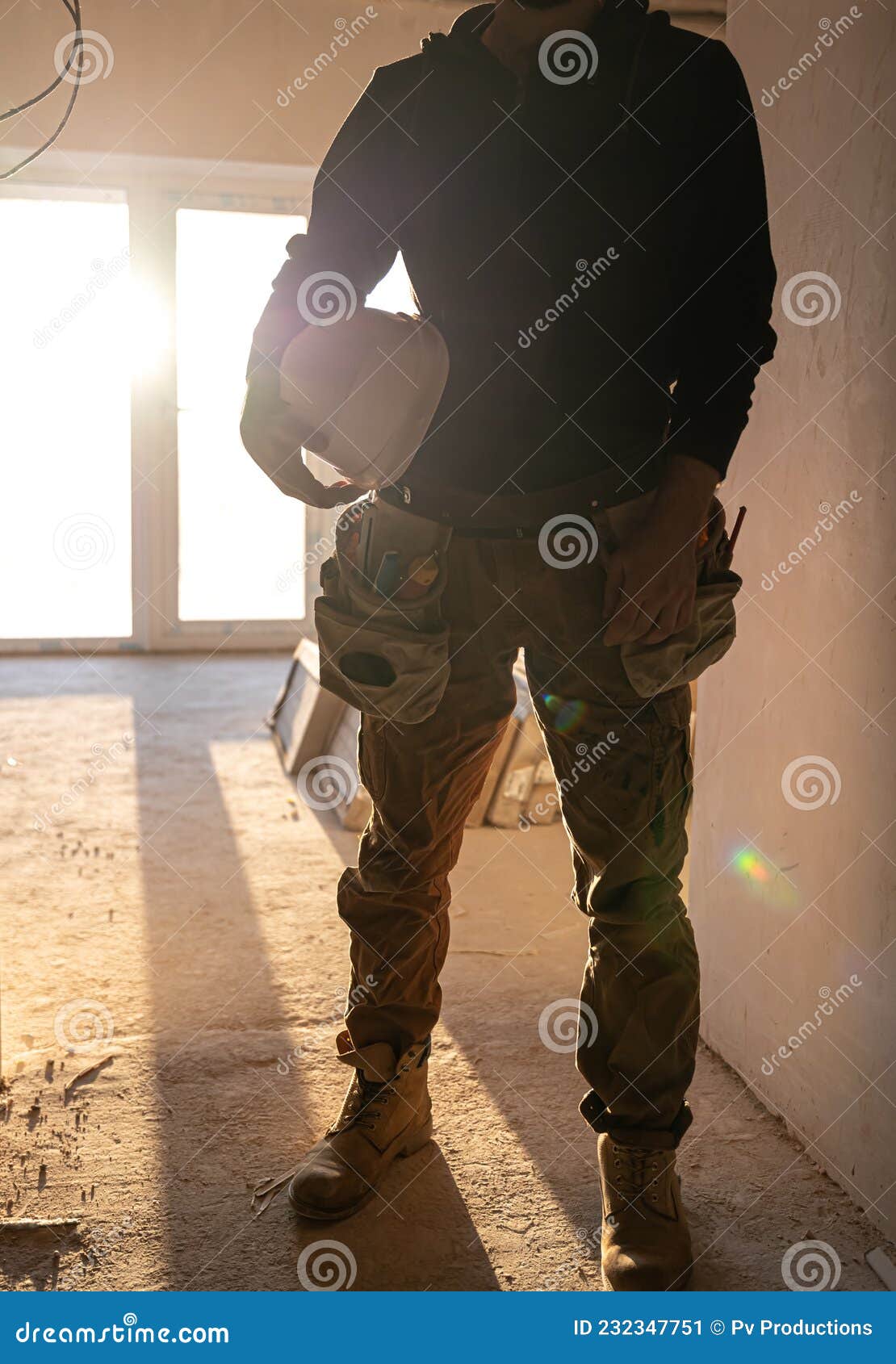 A Man Builder with a Helmet in His Hands. Stock Image - Image of estate ...
