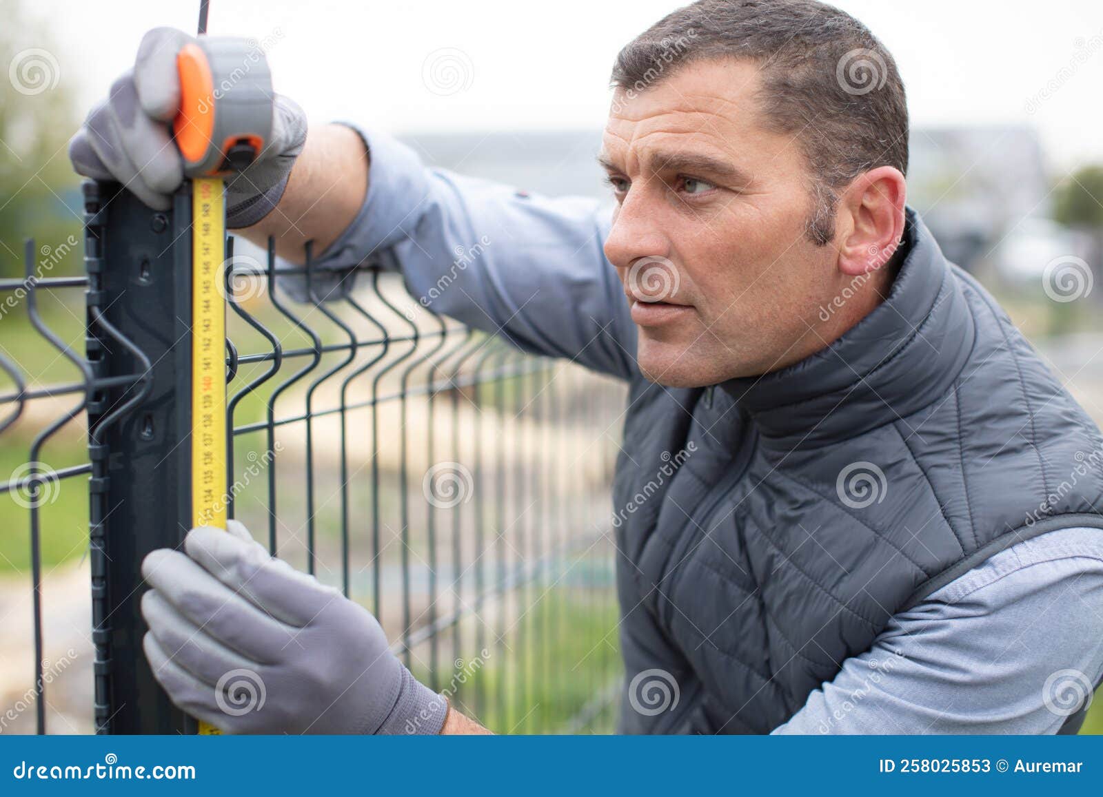 Man Builder Making Fence Using Tape Measurer Stock Image - Image of ...