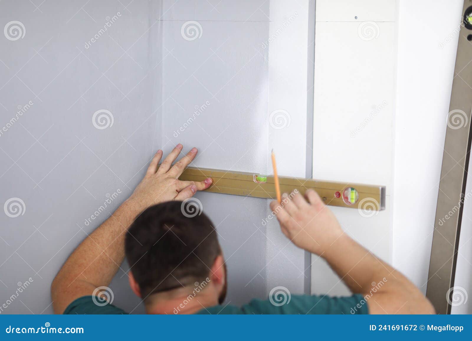 Man Builder Marks the Line on the Wall Stock Photo - Image of drill ...
